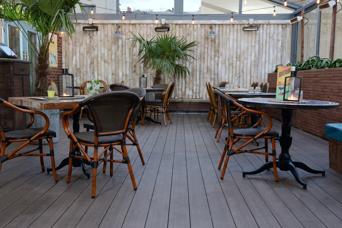 An image of Teak decking tiles - Wallbarn