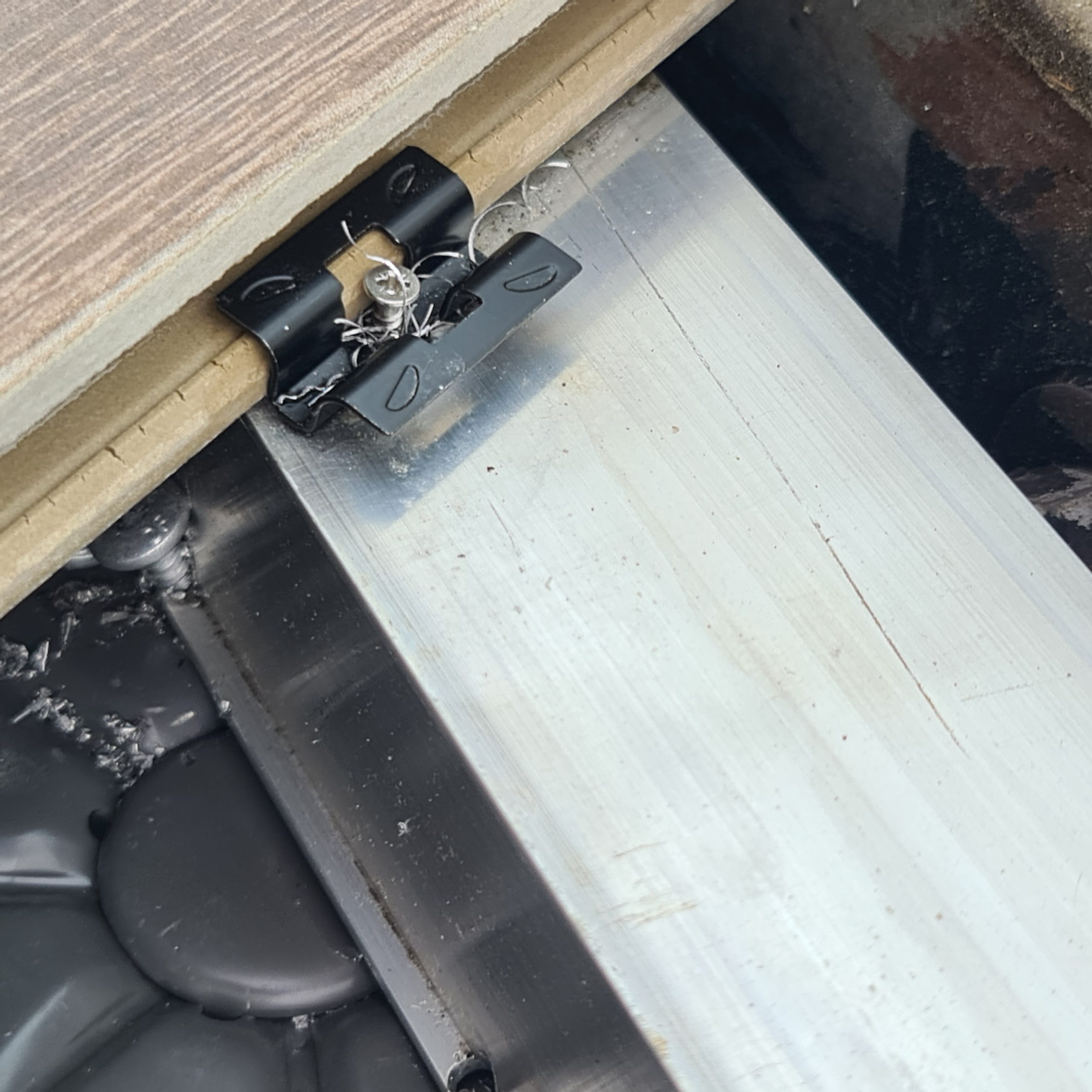 Close up of Wallbarn Decking Clip on Double Box Rail & Porcelain ...